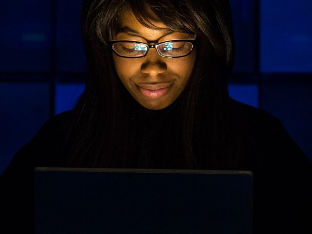 Woman’s Face Illuminated by Laptop | TIM